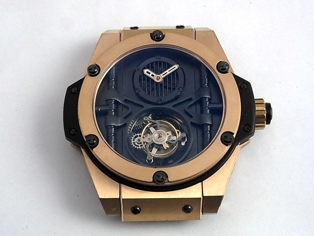 Please could I get some help in identifying the the tourbillon/carousel ...